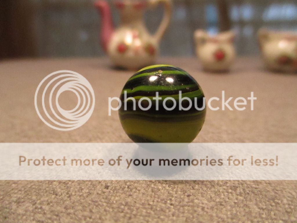 Glows purple - ALL ABOUT MARBLES